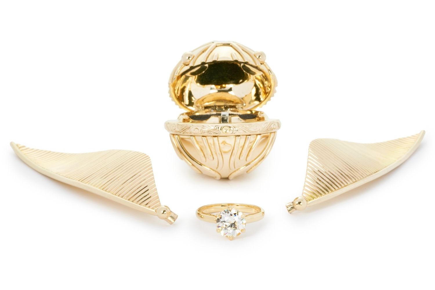 You can now buy a $45k Harry Potter themed golden snitch ring box ...