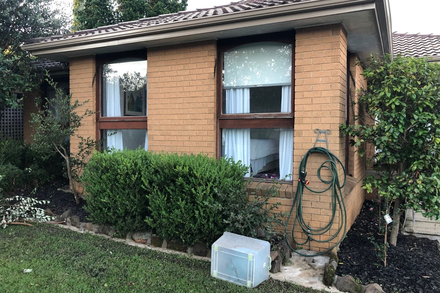 How to spray paint a brick home exterior | Better Homes and Gardens