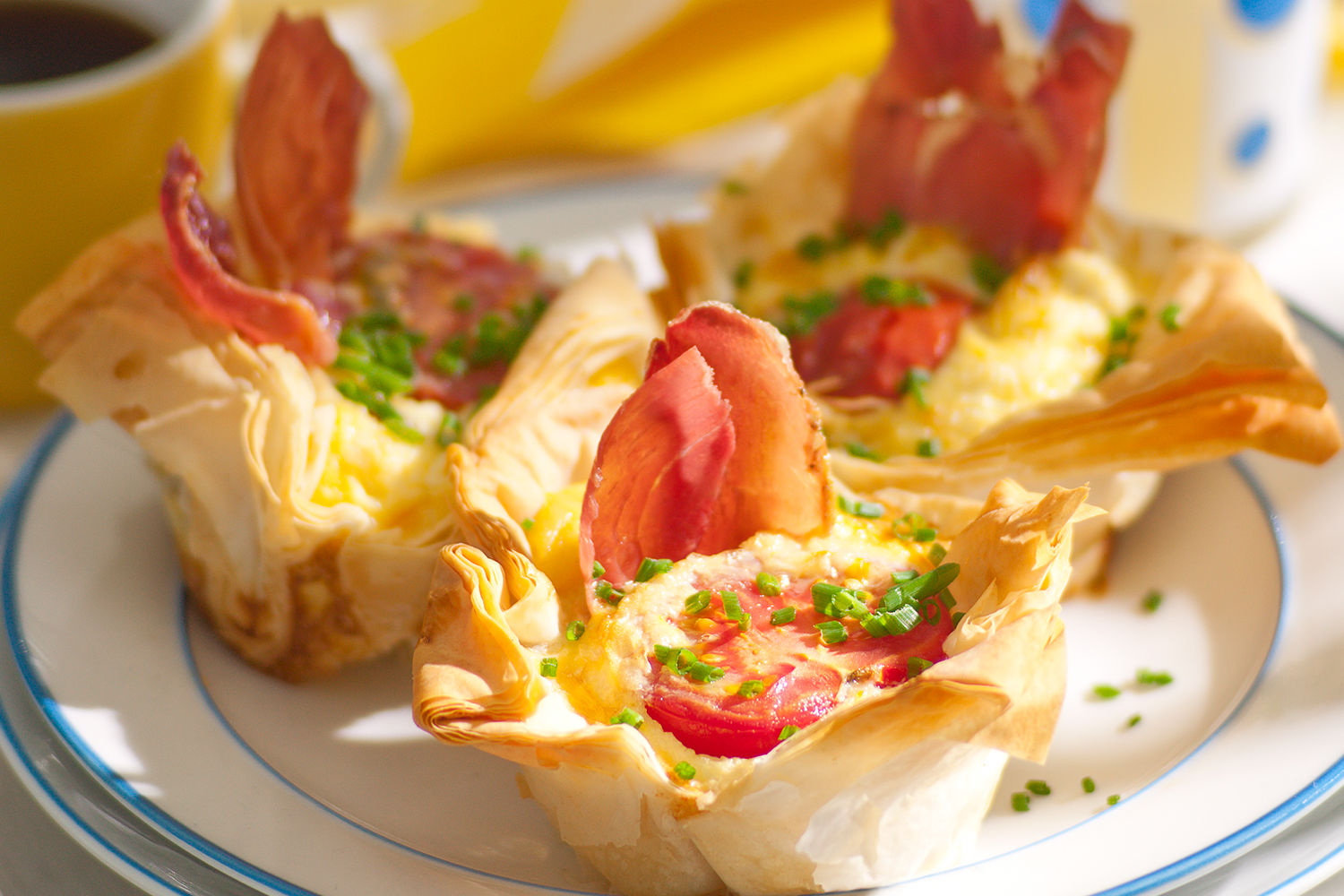 Mini filo quiches with prosciutto, tomato and crème fraîche recipe ...