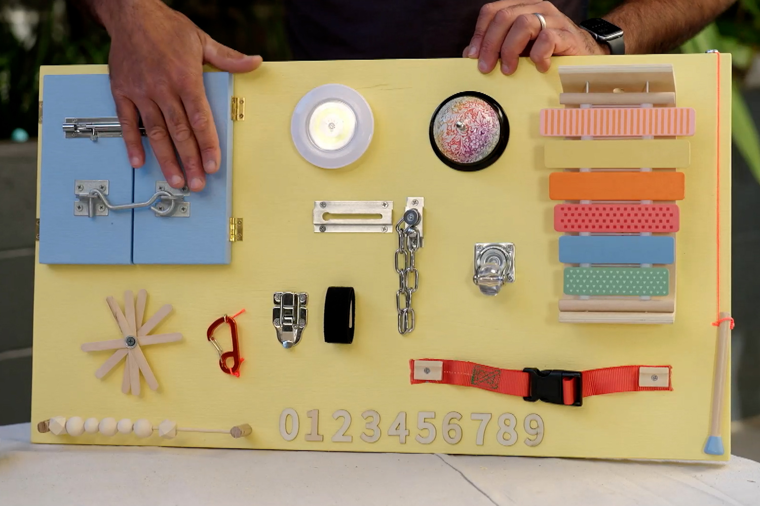 DIY: How To Make A Toddler Busy Board | Better Homes and Gardens