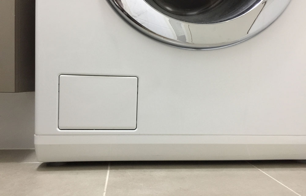 What the little door on a front load washing machine is for | Better ...